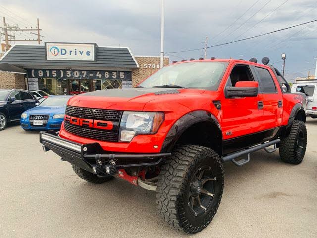 Ford F150 Raptor Lifted Red