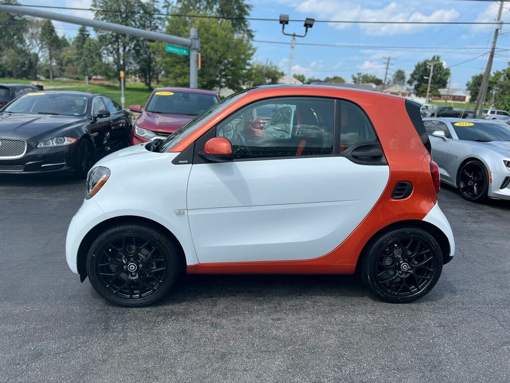 Orange And Blue Smart Car
